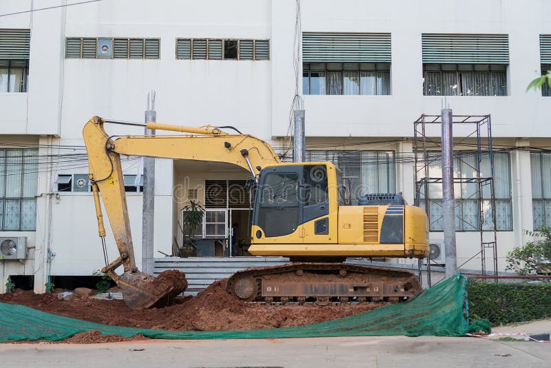 Excavator dig soil stock photo. Image of building, equipment - 128945072