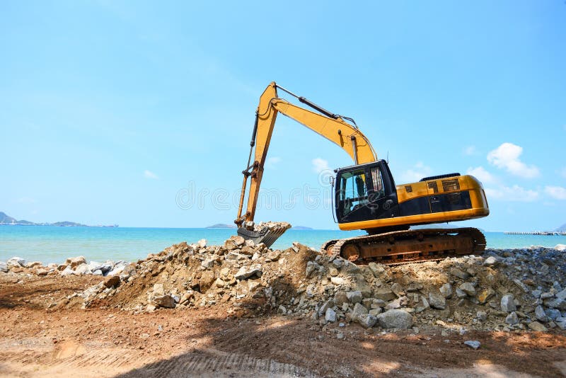 Digger on the Beach stock image. Image of spray, mover - 44974271