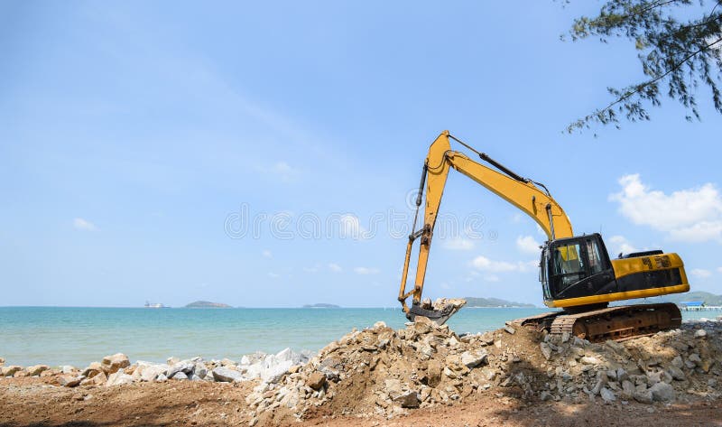 Digger on the Beach stock image. Image of spray, mover - 44974271