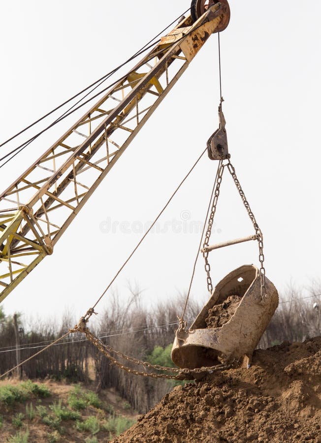 Excavator Digging a Big Bucket Stock Photo - Image of bucket, metal ...