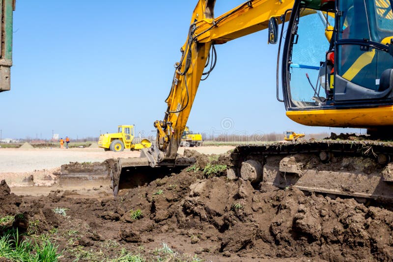 Excavator is Digging on Building Site Stock Photo - Image of digger ...