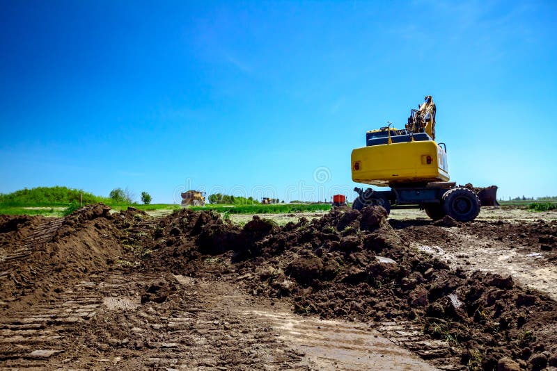 Excavator is Digging on Building Site Stock Photo - Image of ...