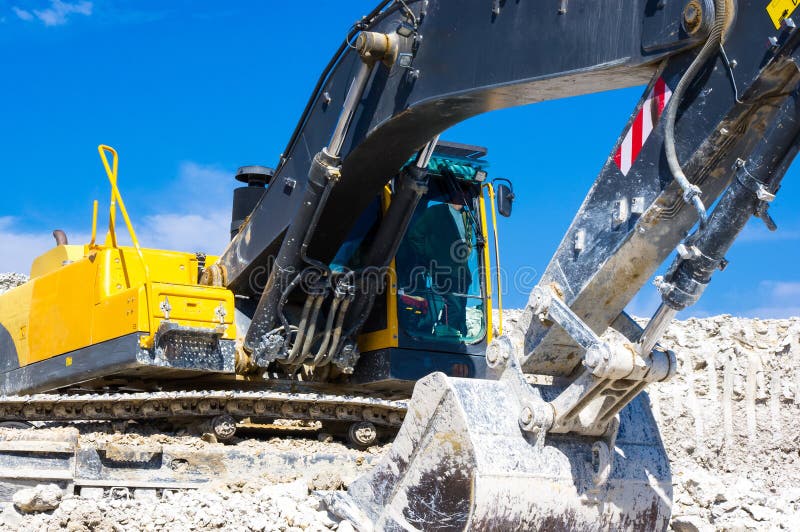 The excavator digging clay stock photo. Image of industry - 93048360