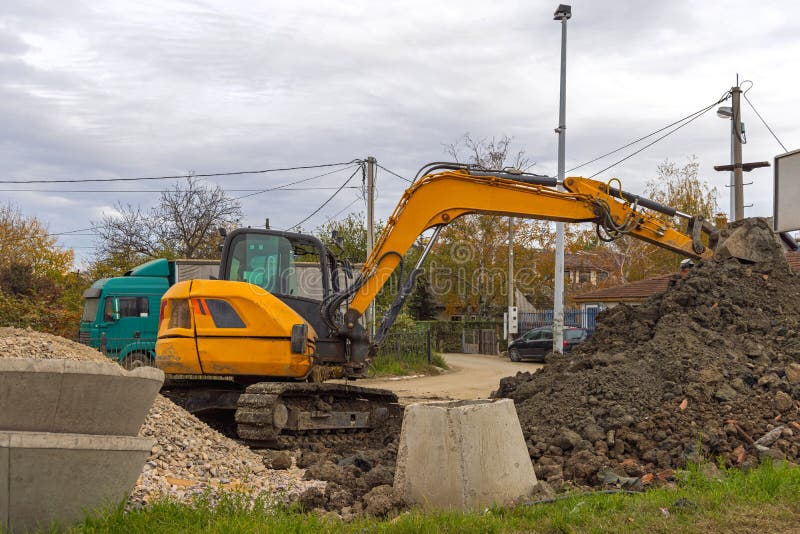 Excavator Digging Dirt stock image. Image of sewer, fall - 263548361