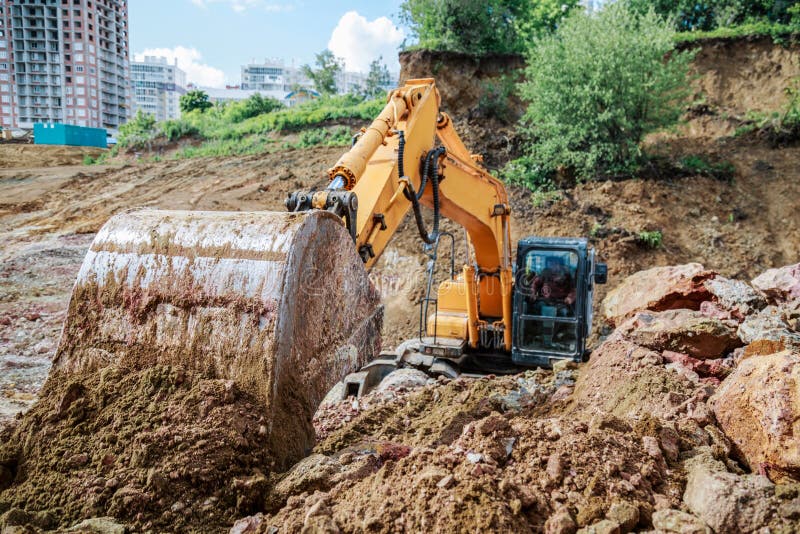 Excavator Digging the Ground. Bucket Closeup Stock Image - Image of ...