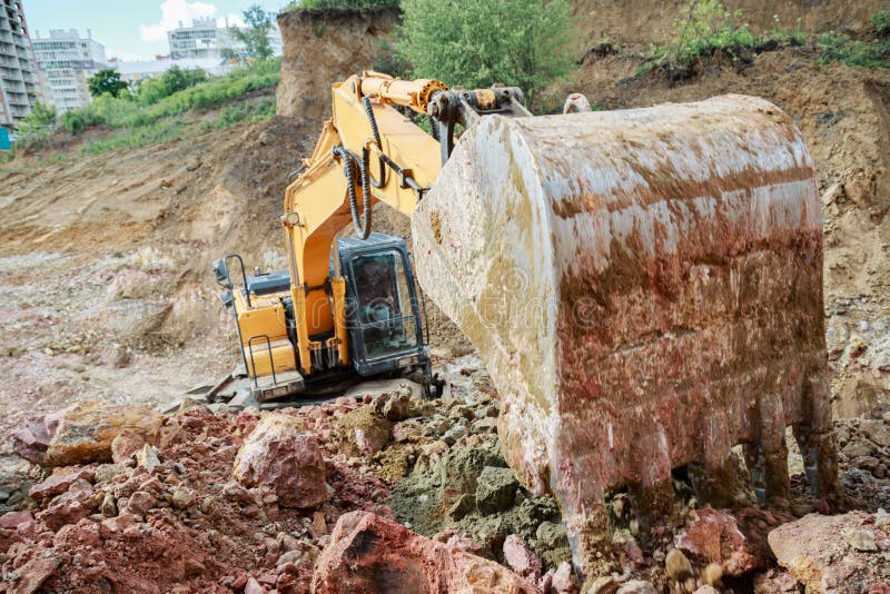 Excavator Digging the Ground. Bucket Closeup Stock Image - Image of ...