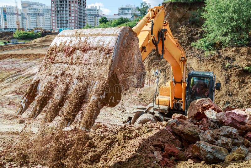 Excavator Digging the Ground. Bucket Closeup Stock Image - Image of ...