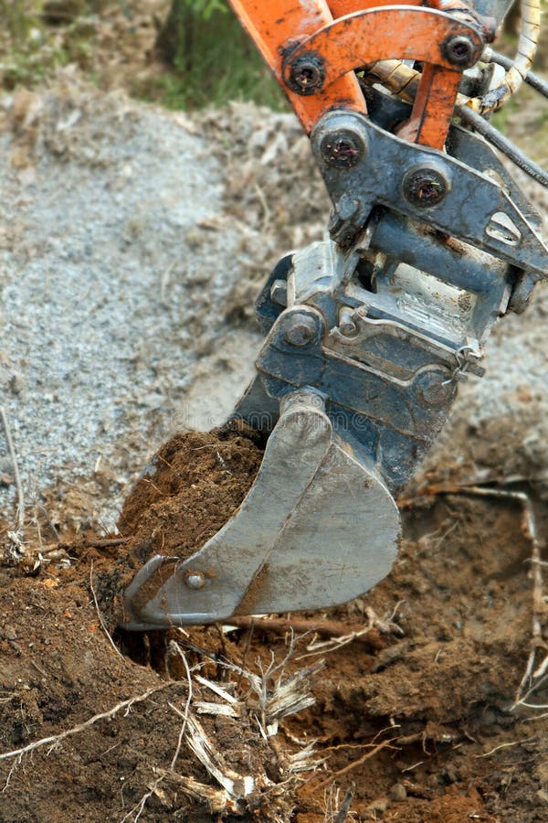 Excavator digging ground stock image. Image of soil, excavator - 79877863