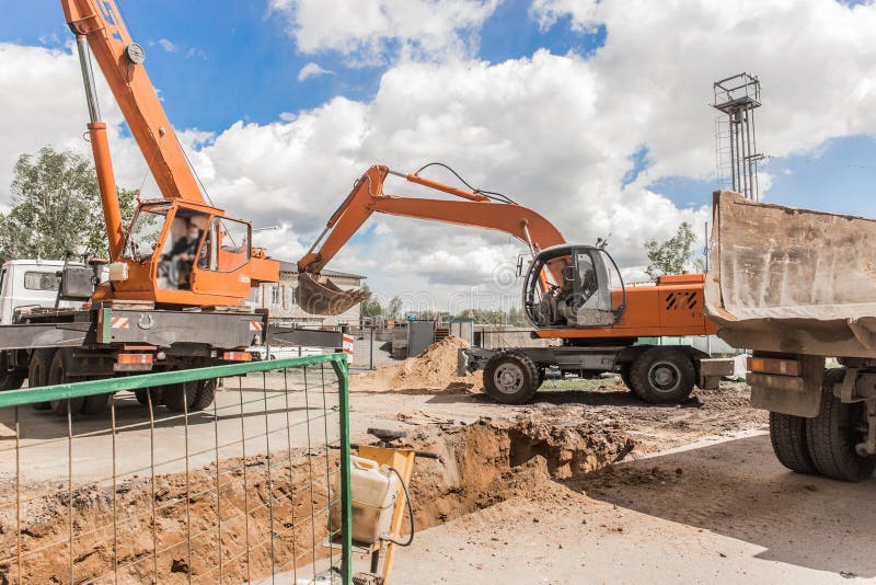 Excavator Digging Heavy Earth Work on an Industrial Machine on a ...