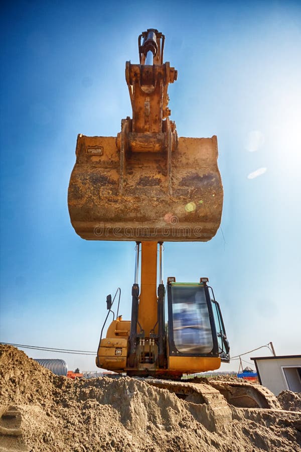 Excavator digging stock photo. Image of sand, soil, excavating - 64567288