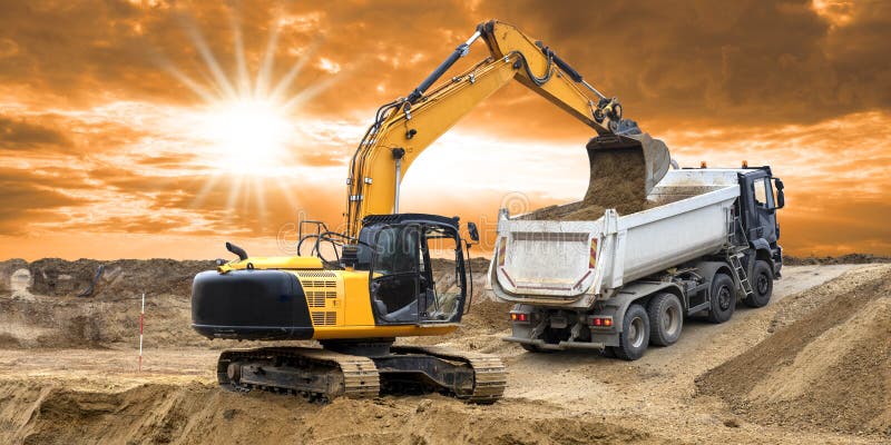 Excavator is Digging and Loading at Construction Site Stock Image ...