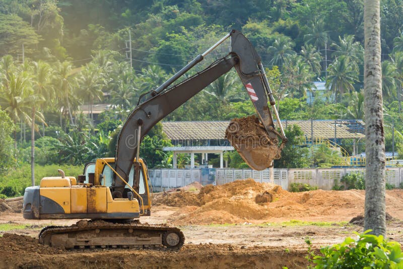 Excavator Digging and Removing Earth . Stock Photo - Image of ...