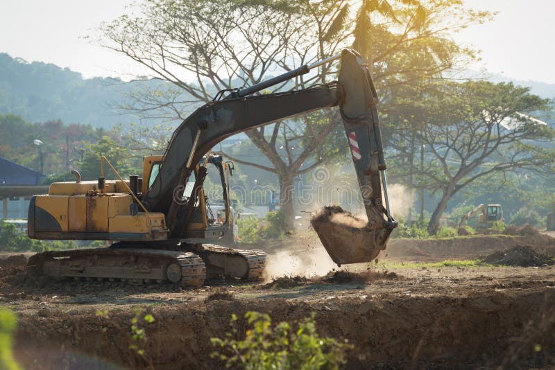 Excavator Digging and Removing Earth . Stock Photo - Image of ...