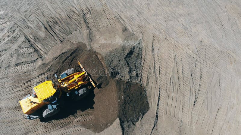 Excavator is Digging Copper Ore in a Top View Stock Footage - Video of ...