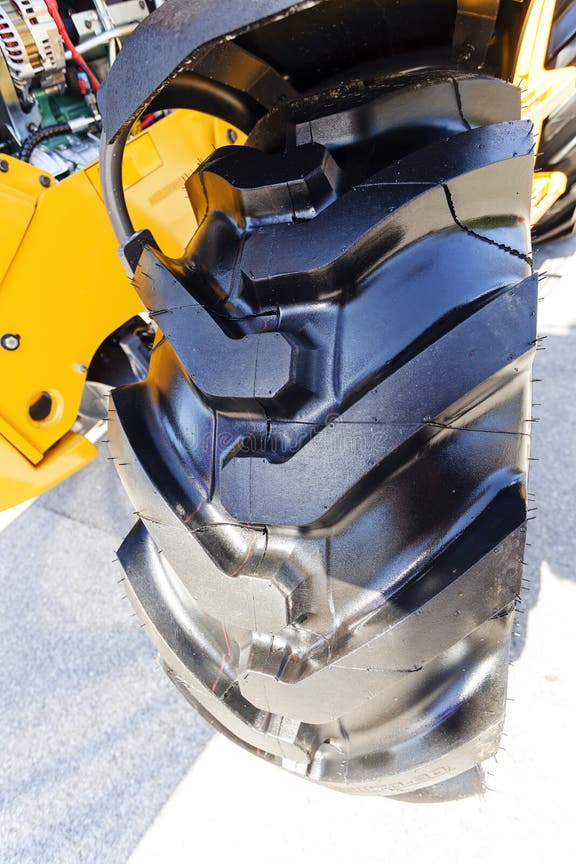 Excavator digging tire stock photo. Image of operator - 72347928