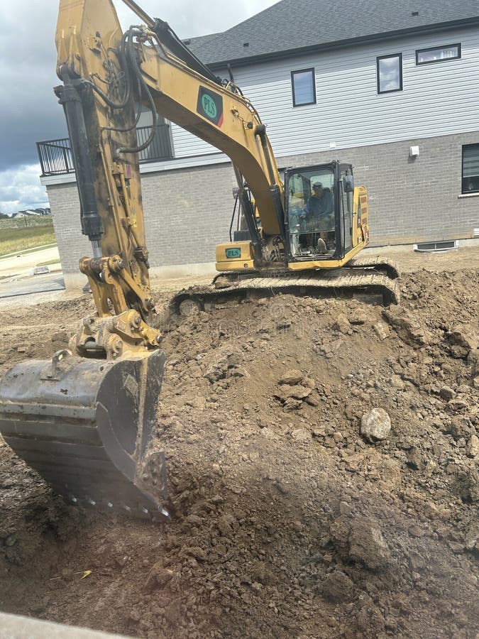 Excavator Digging a Trench for a New Building Stock Image - Image of ...
