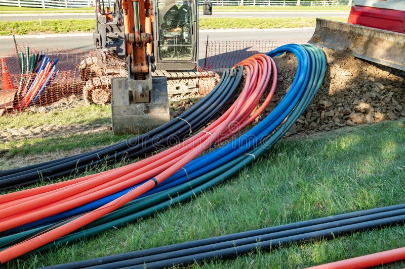Excavator and Drilling Equipment for Laying Broadband Internet Cables ...