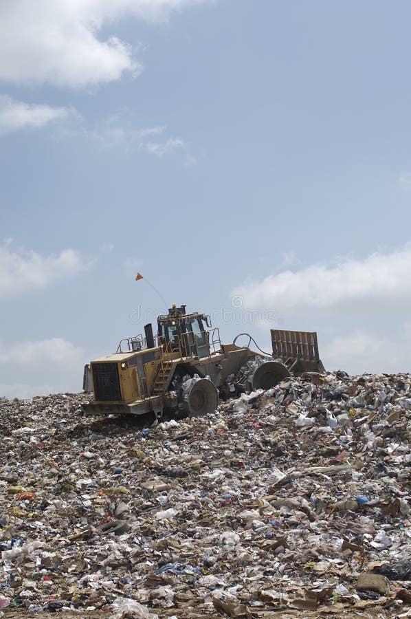 An Excavator Loader at Dumping Ground Stock Photo - Image of outdoors ...