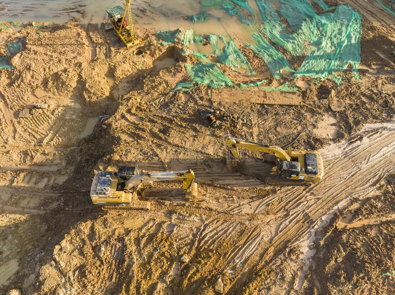 Excavator on Earthmoving at Construction Site, Aerial View Stock Photo ...