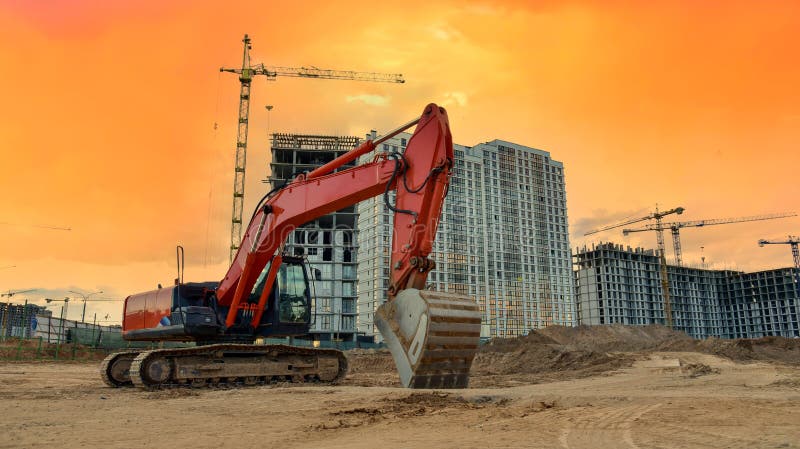 Excavator during Earthmoving Work at Construction Site on Sunset ...