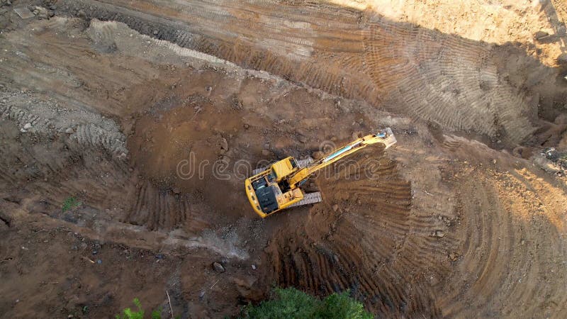 Excavator on Earthworks. Arial View of the Groundwork on Construction ...