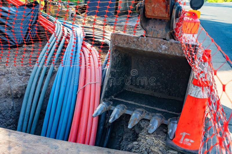 Excavator and Equipment for Laying Broadband Internet Cables ...