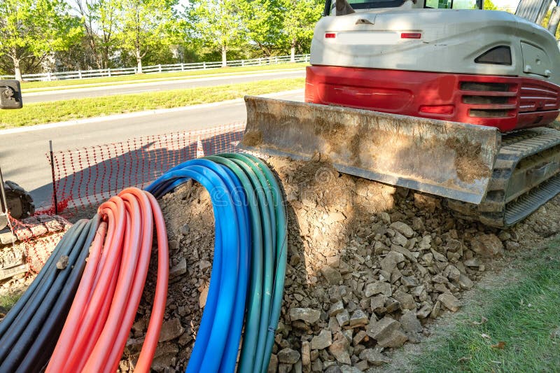 Excavator and Equipment for Laying Broadband Internet Cables ...