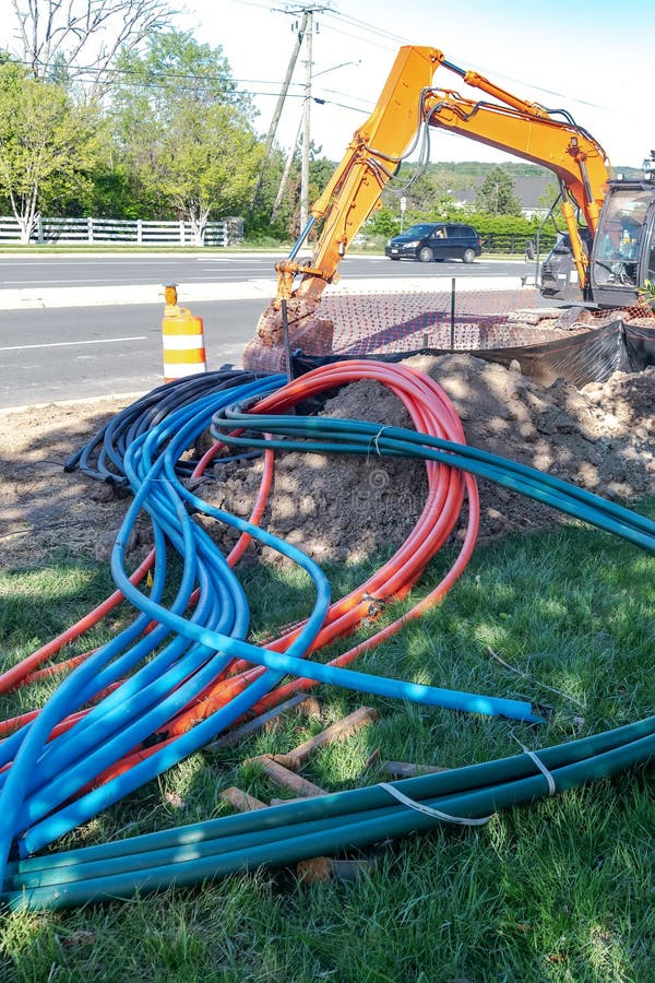 Excavator and Equipment for Laying Broadband Internet Cables ...