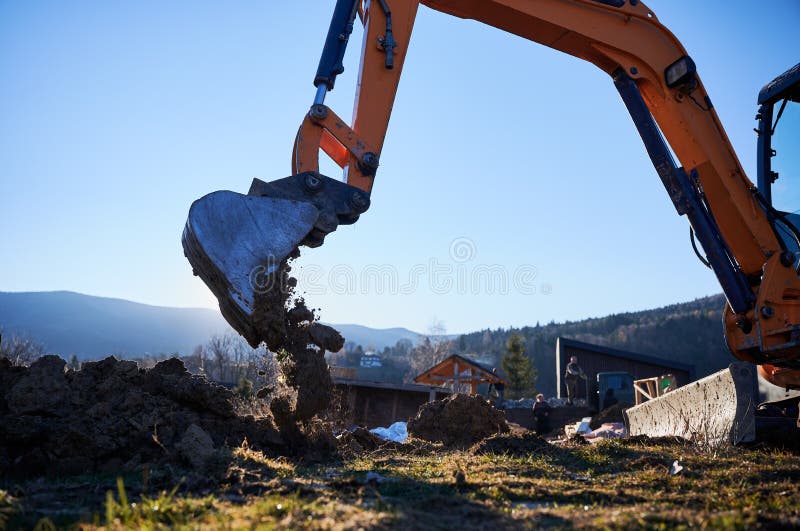 Excavator Excavate Earth at Construction Site. Editorial Stock Photo ...