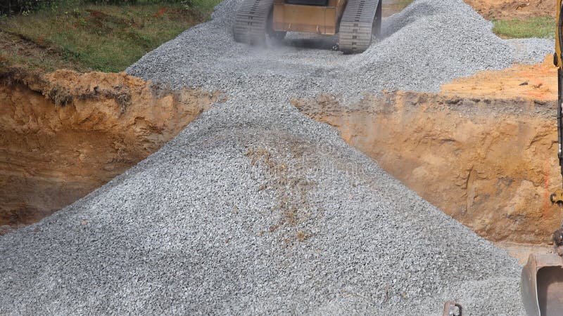 Excavator Extracting Backfill of Foundation Stone Stock Video - Video ...