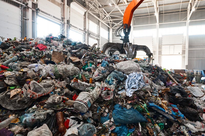 Excavator Grabs Trash in Warehouse of Waste Processing Plant Stock ...