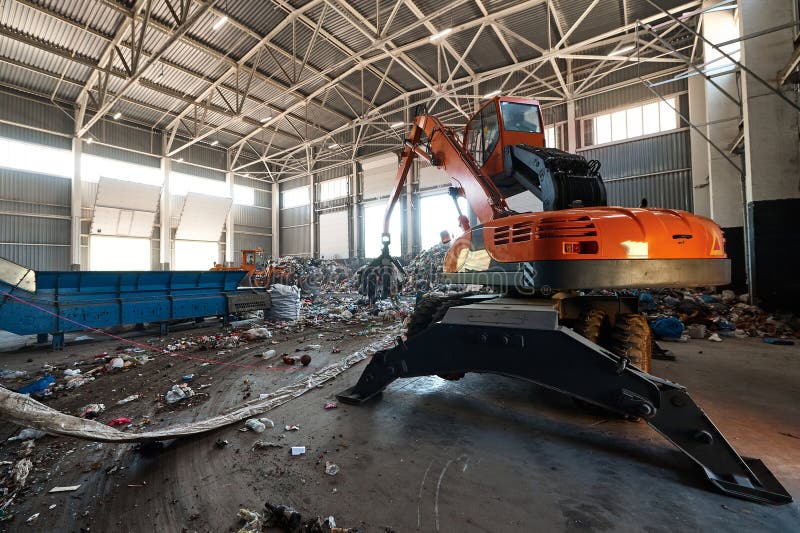 Excavator Grabs Trash in Warehouse of Waste Processing Plant Stock ...