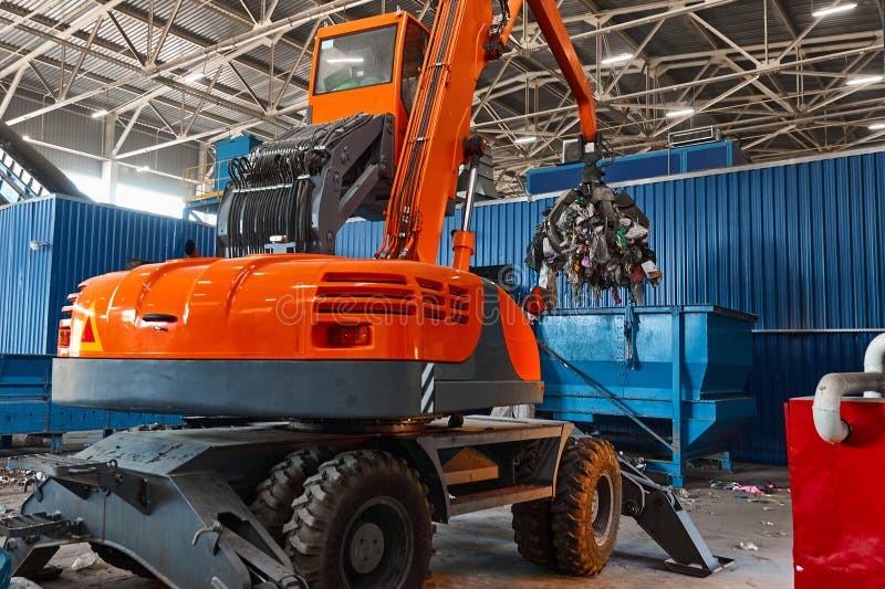 Excavator Grabs Trash in Warehouse of Waste Processing Plant Stock ...