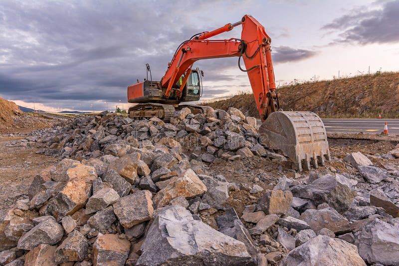 Excavator of Great Size Extracting Stone Stock Photo - Image of loader ...