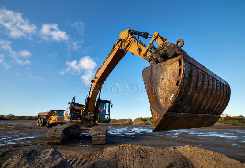 Backhoe in Action on a Construction Site Close Up Stock Photo - Image ...