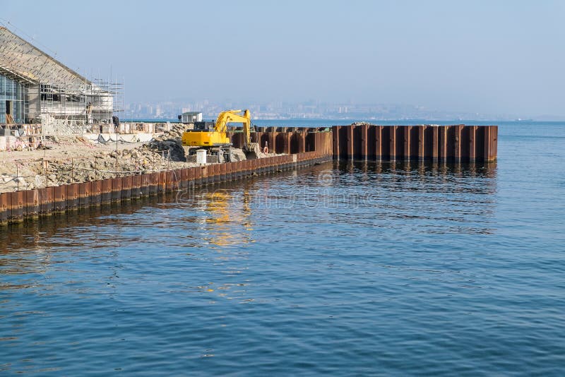 Excavator stock image. Image of embankment, yellow, machinery - 84188333