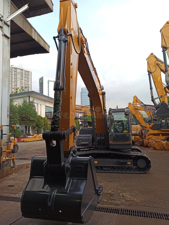 Excavator Heavy Equipment in the Workshop Editorial Stock Photo - Image ...