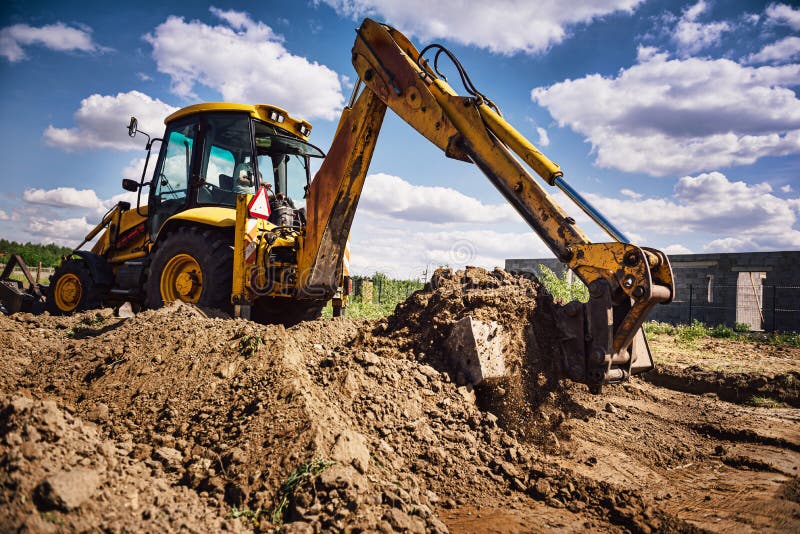 Excavator at House Construction Site - Digging Foundations for Modern ...
