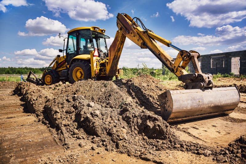 Excavator at House Construction Site - Digging Foundations for Modern ...