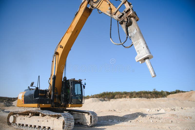 Excavator with Hydraulic Hammer on Road Construction Works Stock Photo ...