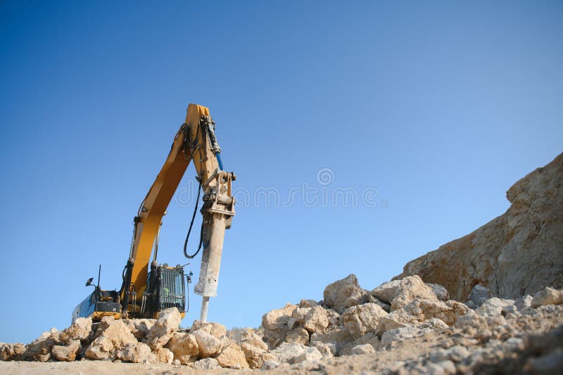 Excavator with Hydraulic Hammer on Road Construction Works Stock Image ...