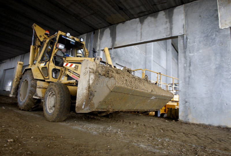 Excavator Inside Industrial Building in Progress Editorial Stock Photo ...