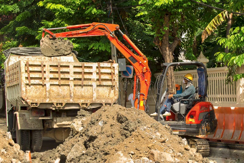 Excavator Loader Driver Working in Construction Area. Editorial ...