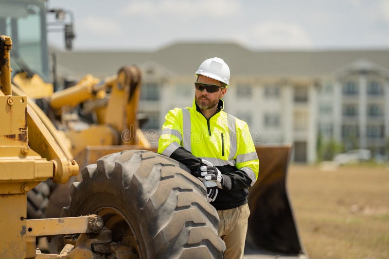 Excavator Loader Tractor and Buider Worker. Hispanic 40 S Builder on ...
