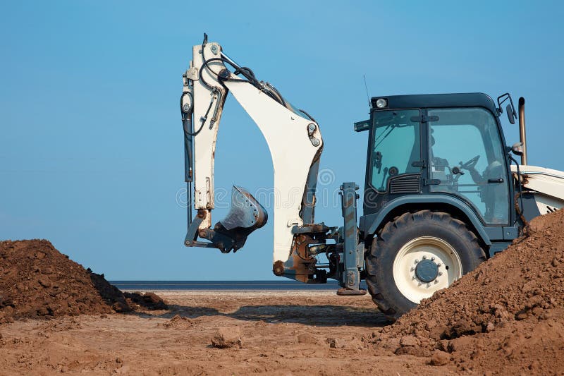 Excavator Loader Working at Ground Area, Digging Process. Yellow Bucket ...
