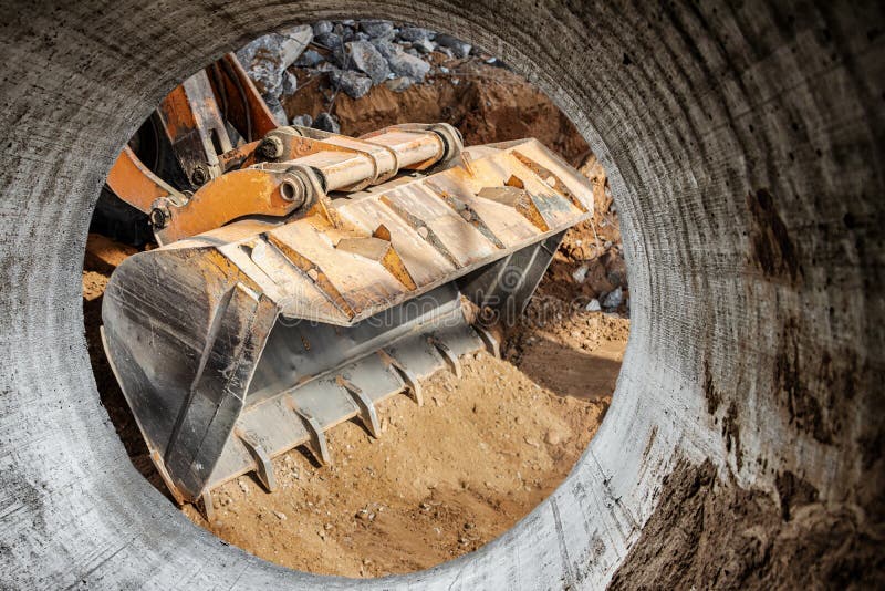 The Excavator Loader Works with a Bucket for Transporting Sand at a ...