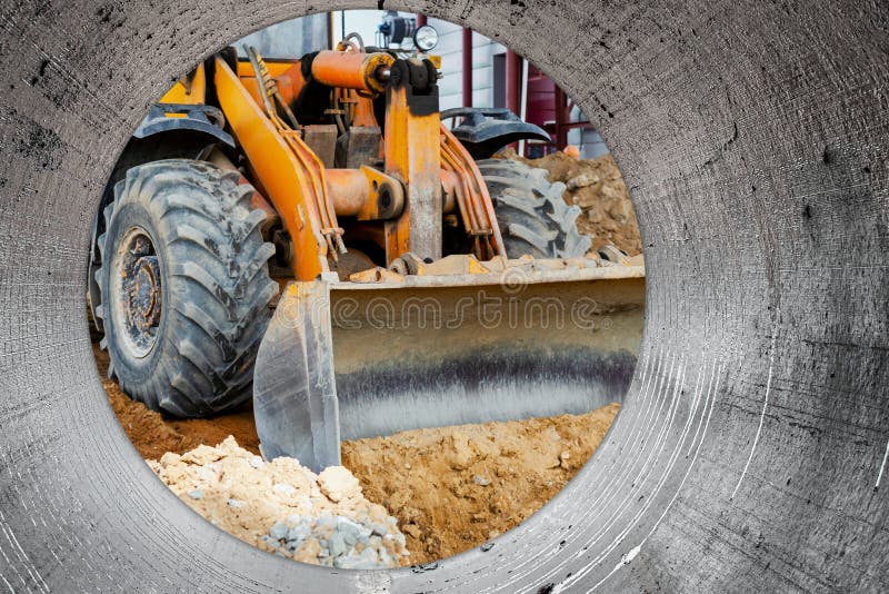 The Excavator Loader Works with a Bucket for Transporting Sand at a ...