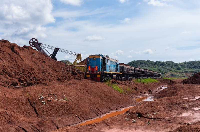 Excavator Loading Clay To the Train Stock Image - Image of quarry, view ...
