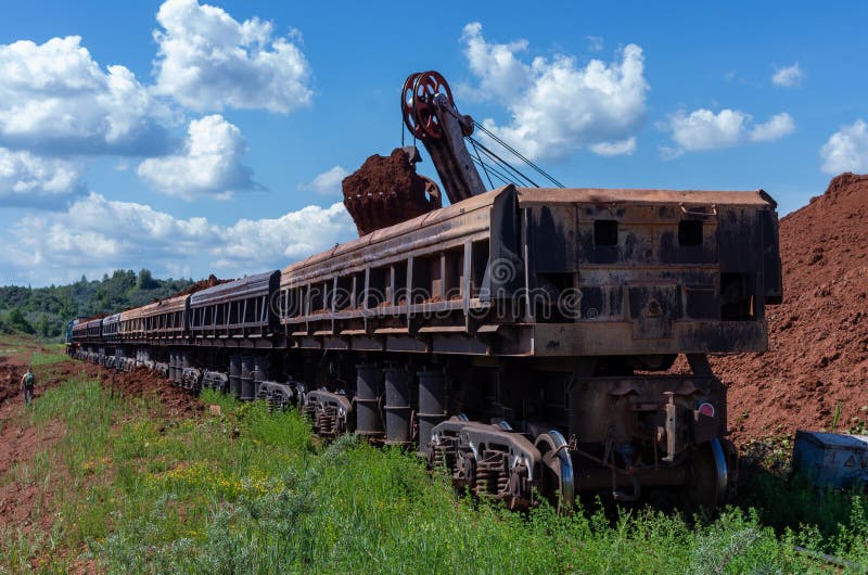 Excavator Loading Clay To the Train Stock Photo - Image of industry ...