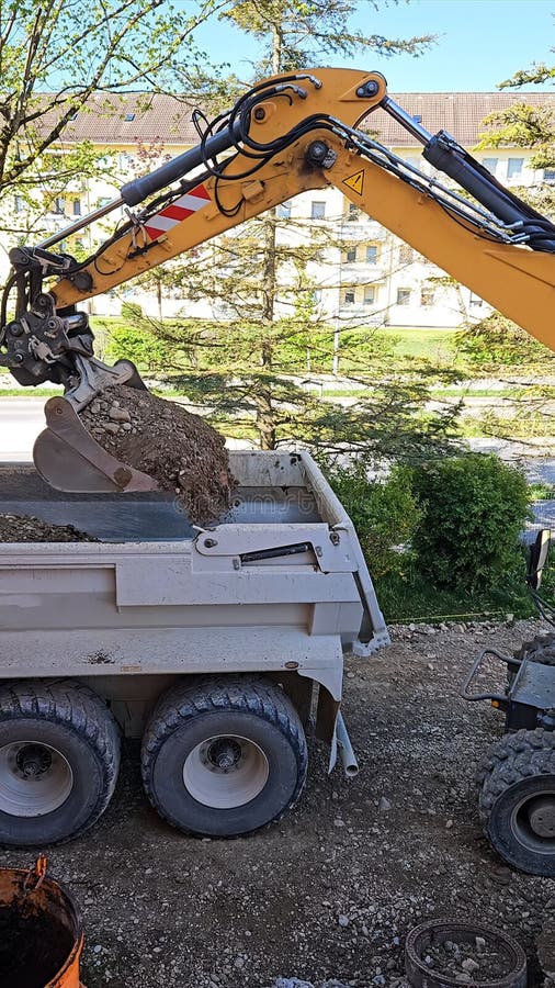 Excavator Loading Dump Truck: Earthmoving Construction Site Stock Photo ...
